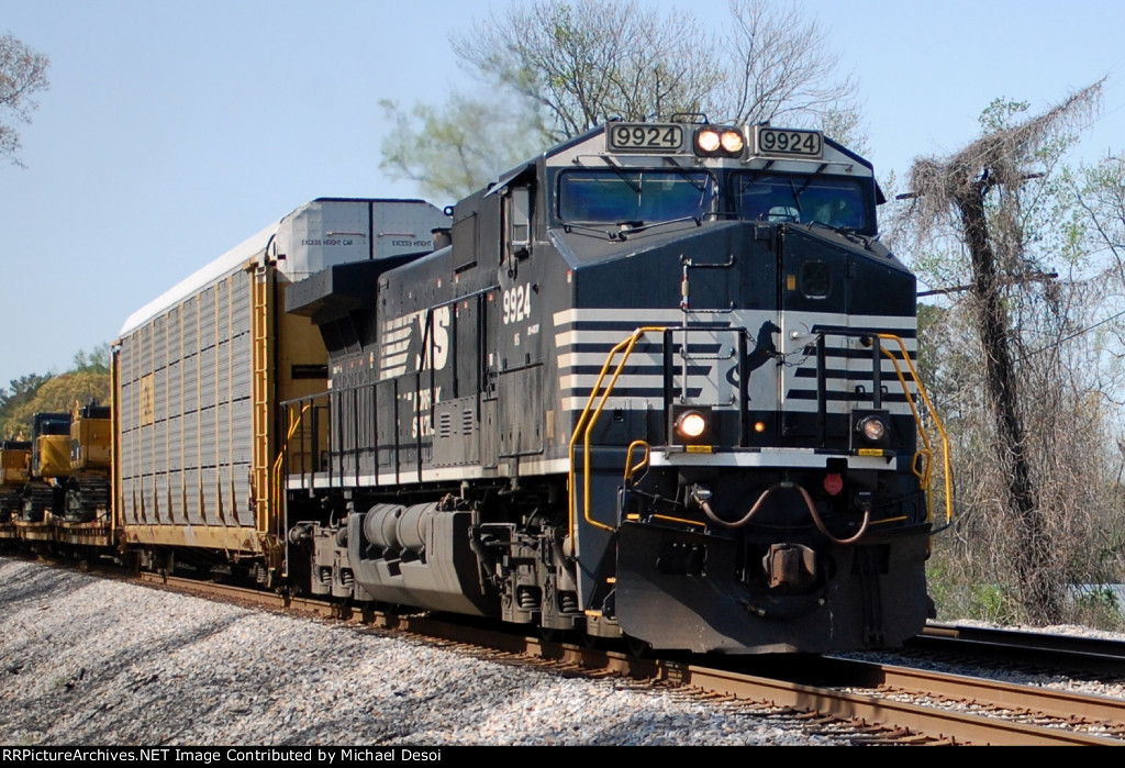 NS C40-9W #9924 leads an eastbound "cat" train across Walters Hwy.